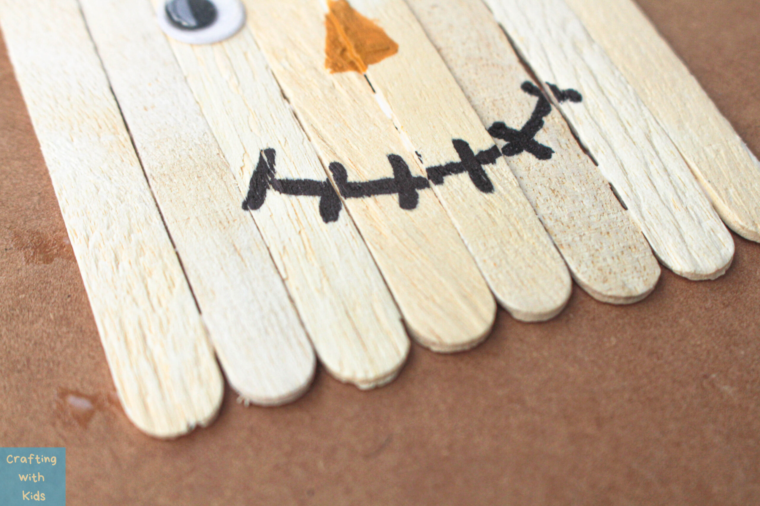 Popsicle Stick Scarecrow for a fun Fall Craft