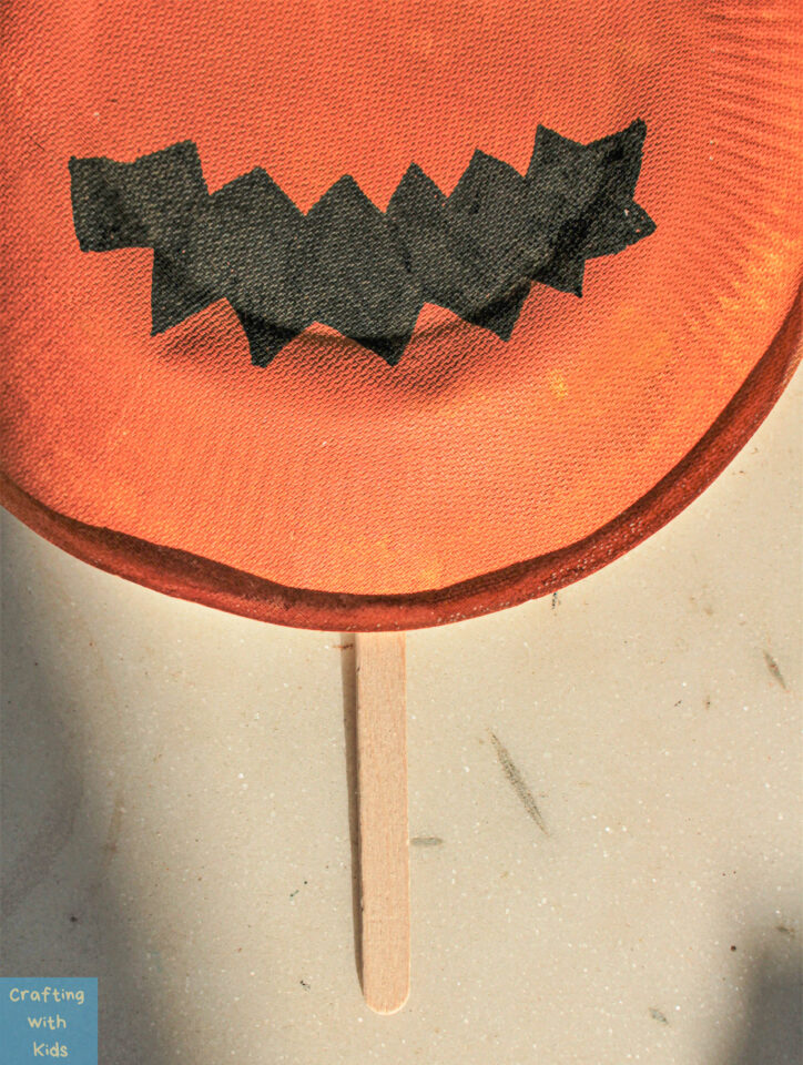 Paper Plate Pumpkin Mask for an Easy Halloween Craft