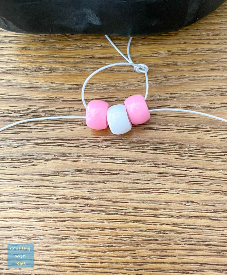 How to Make a Beaded Cross with Pony Beads